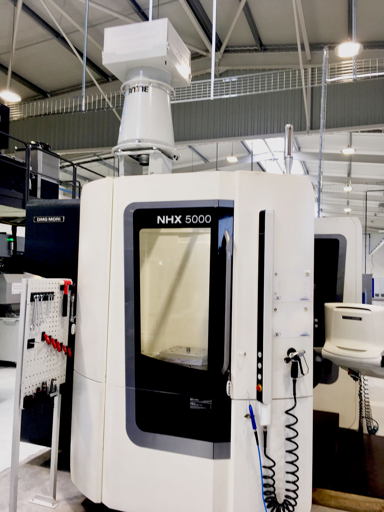 The oil mist eliminator Clara installed on a DMG MORI NHX 5000